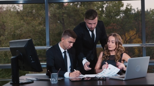 The Boss Checks The Work Of Colleagues, Stock Footage | VideoHive