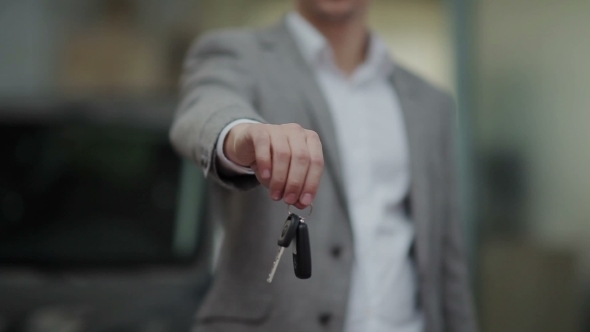 Man's Hand Handing a Car Key, Stock Footage | VideoHive