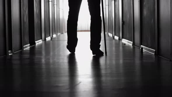 Man Limping along Hospital Corridor, Stock Footage | VideoHive