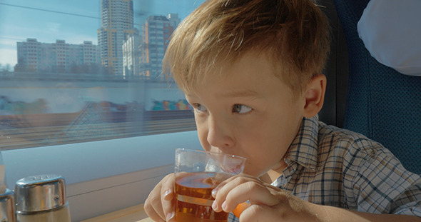 Child Having Tea And Looking Out Window In Moving, Stock Footage ...