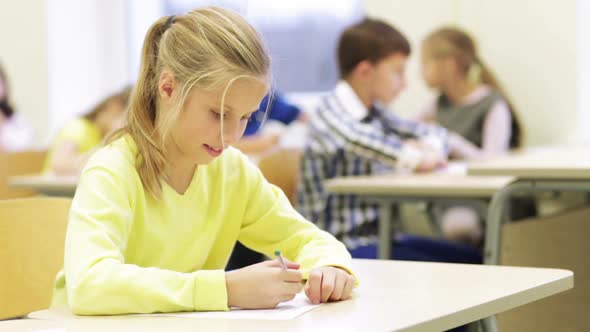 Group Of School Kids Writing Test In Classroom 7, Stock Footage | VideoHive