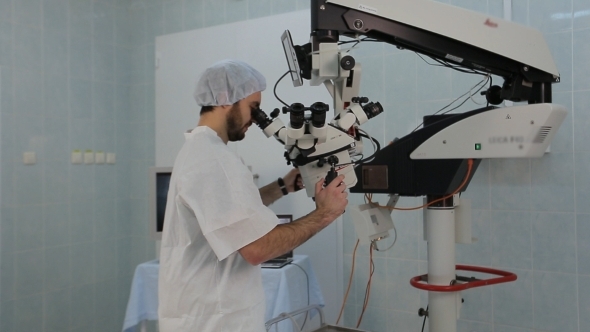 Man Using a Big Microscope System In a Medical, Stock Footage | VideoHive
