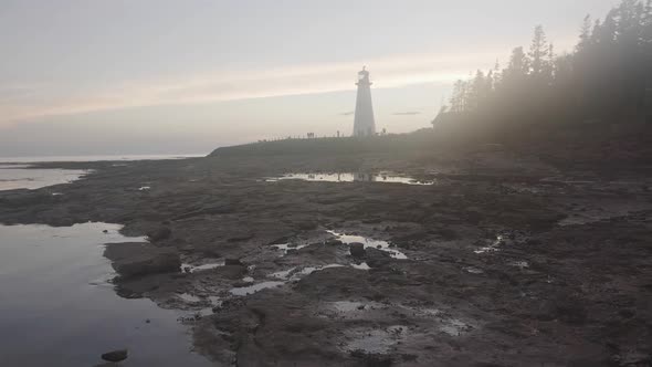Lighthouse moving closer towards it along the Coast, Stock Footage