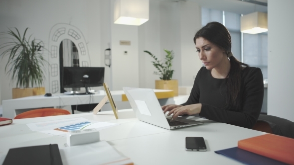 Attractive Business Woman Working At The Office, Stock Footage | VideoHive