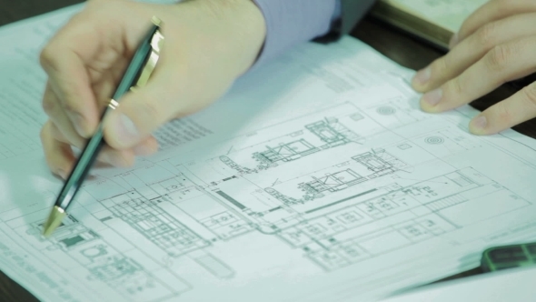 Man Is Checking Drawing Of Equipment, Stock Footage | VideoHive