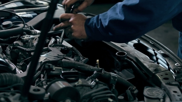 Mechanic Repairing Car Engine, Stock Footage | VideoHive