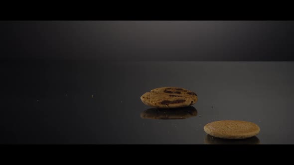 Falling cookies from above onto a reflective surface - COOKIES , Stock ...