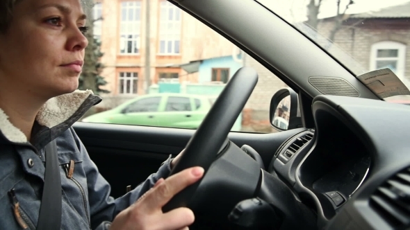 Short Hair Blond Woman Driving a Car, Stock Footage | VideoHive