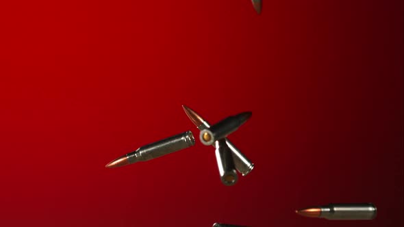 Bullets falling bouncing in ultra slow motion , Stock Footage | VideoHive