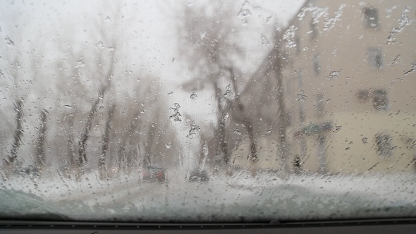 Melted Snow Flows Over the Windshield of the Car, Stock Footage | VideoHive