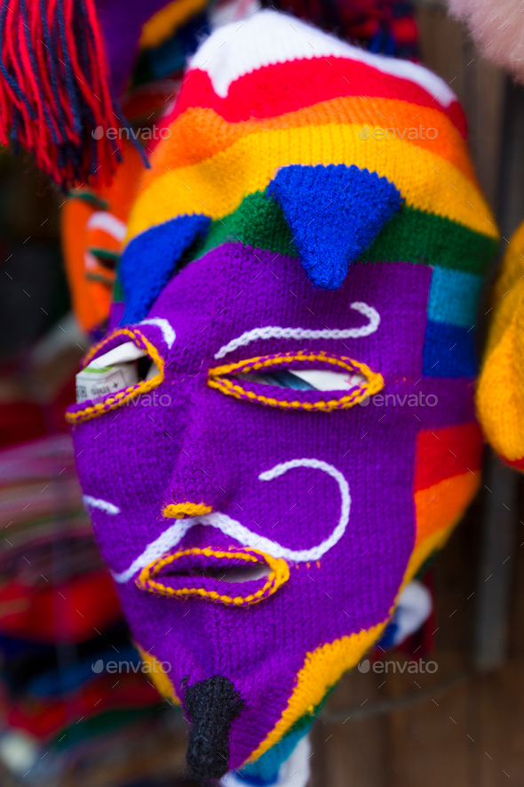 Colored woolen mask for sale at the market in Cusco, Peru Stock Photo ...
