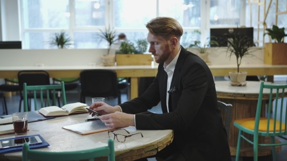 Multitasking Man Working In Modern Office, Stock Footage | VideoHive