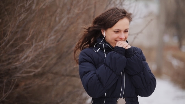 Beautiful Girl With Headphones Warms Cold Hands On, Stock Footage ...