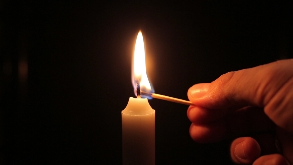 Lights a Candle, Stock Footage | VideoHive