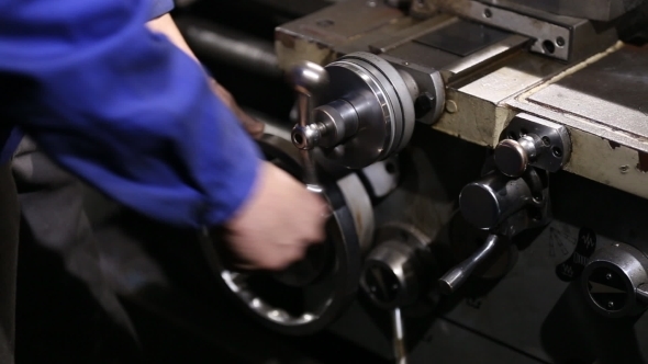 Operator Turns The Handle To Move The Cutter, Stock Footage | VideoHive