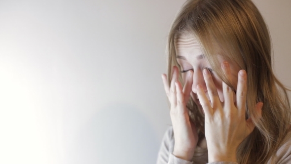 Blonde Woman Rubs Her Eyes Stock Footage Videohive