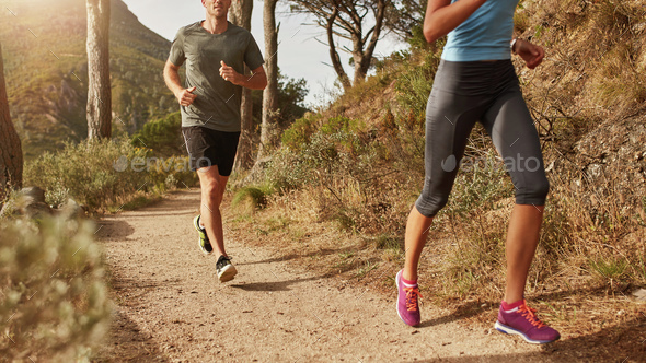 Trail running on a mountain path Stock Photo by jacoblund | PhotoDune
