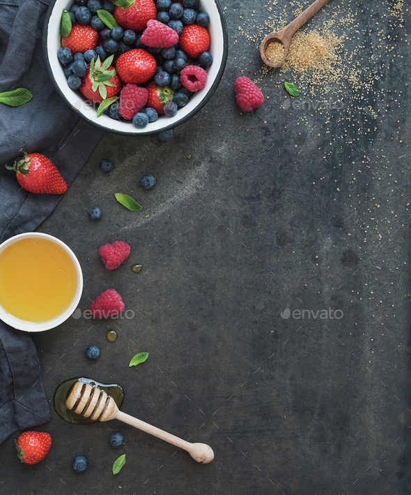 Berry frame with copy space on right. Strawberries, raspberries ...