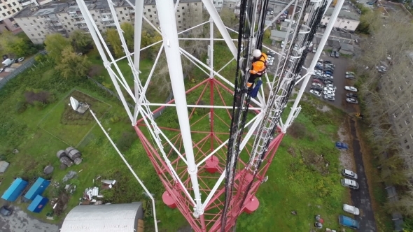 Aerial View. Workers Climb The TV Tower, Stock Footage | VideoHive