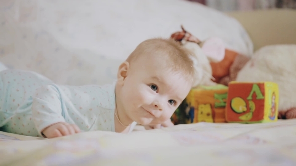 Happiness Baby Having Fun On The Bed, Stock Footage | VideoHive