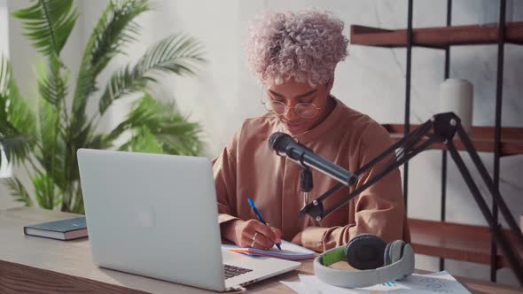 Smiling African Blogger Leads Popular Live Stream Video at Home Studio ...