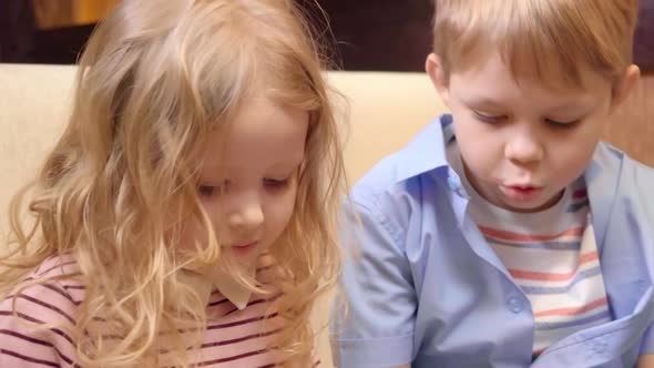 Little Brother and Sister Discussing Something, Stock Footage | VideoHive