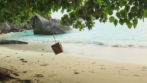 A Rope Swings On The Beach, , Stock Footage | VideoHive