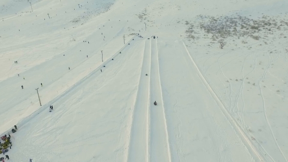 Flight Above Tne Snow Tubing Track., Stock Footage | VideoHive