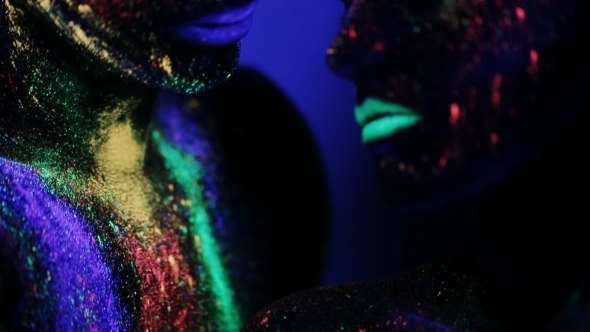 Body Man And Woman Glows Under Ultraviolet Light, Stock Footage | VideoHive