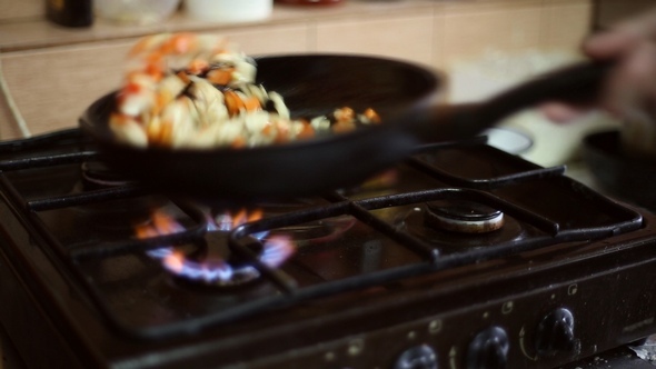 The Chef Fries Chicken with Vegetables in a Frying Pan, Stock Footage