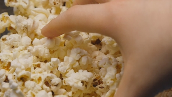 Hand Is Grabbing Popcorn, Stock Footage | VideoHive