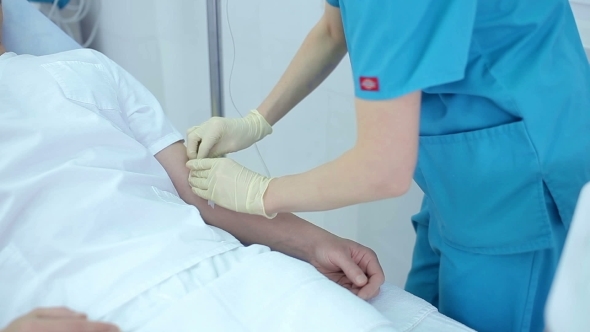 Nurse Pulls The Needle From The Vein Of Patient, Stock Footage | VideoHive