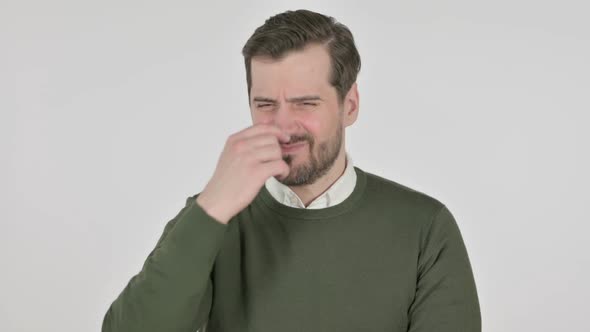 Portrait of Man Smelling Something Bad Odor White Screen, Stock Footage
