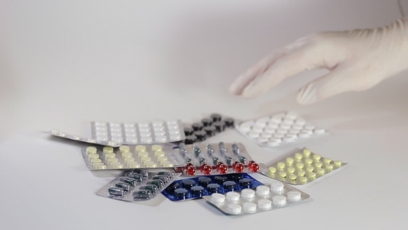Male Hand Holding a Pack Of Medicine Tablets, Stock Footage | VideoHive
