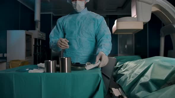 Adult Surgeon Prepares Tools for Surgery, Stock Footage | VideoHive