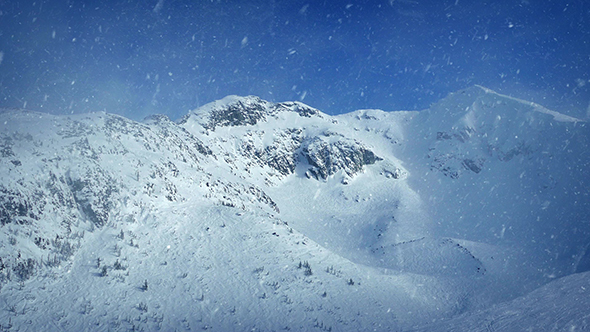 Snow Falling On Mountain Top, Stock Footage | VideoHive