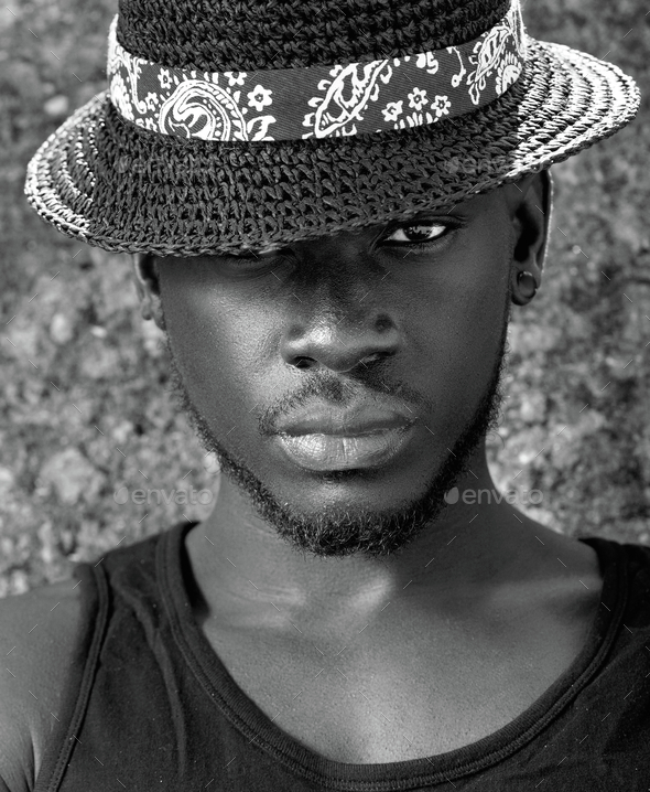Portrait of a handsome male fashion model with hat Stock Photo by ...