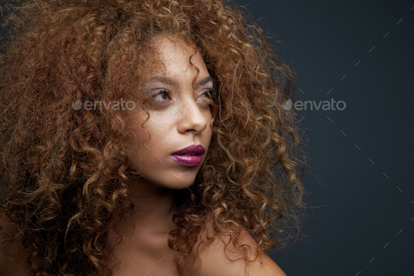 Gorgeous female fashion model with curly hair Stock Photo by ...