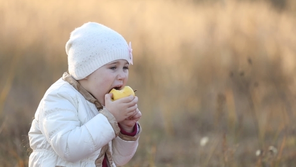 Child Eating An Apple, Stock Footage | VideoHive
