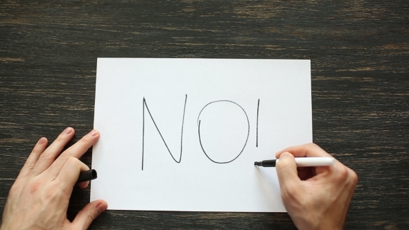 Man Hand Writing No With Black Marker On White Paper On Black Wood ...