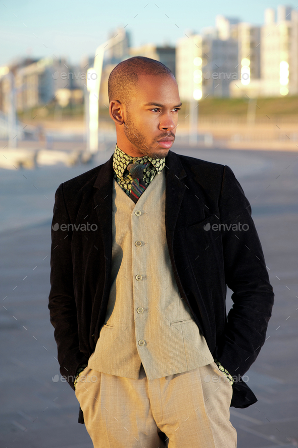 Male fashion model posing outdoors Stock Photo by mimagephotography