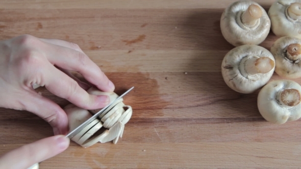 Woman's Hands Cutting Mushroom Champignon, Stock Footage | VideoHive