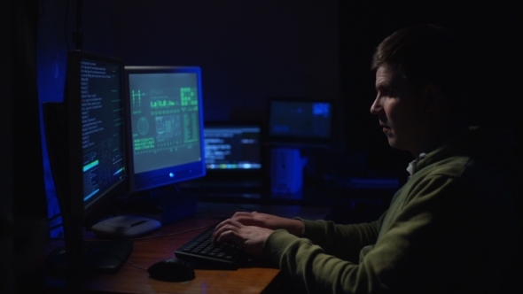 Hacker Works At The Computer, Stock Footage | VideoHive