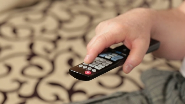 Channel Surfing With Remote Control In Hand, Stock Footage | VideoHive