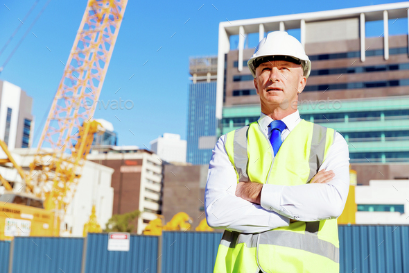 Engineer builder at construction site Stock Photo by nexusplexus ...