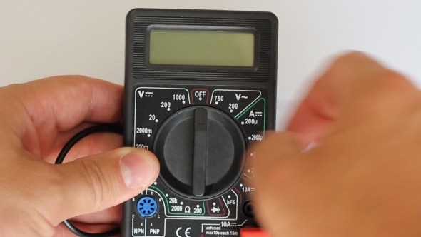 Man Measures Digital Multimeter , Stock Footage | VideoHive