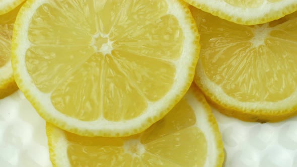Rotation of a juicy yellow lemon. Top view, 360 degree rotation, close ...