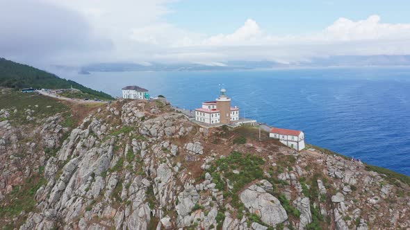 180 degree aerial view of famous lighthouse on rocky cape with the ...