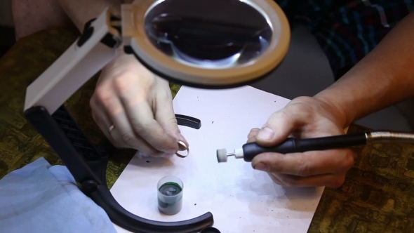 Jeweler Polishing Gold Ring, Stock Footage | VideoHive