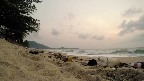 Waste On Beach Causes Environmental Pollution. Trash On Sand, Stock Footage